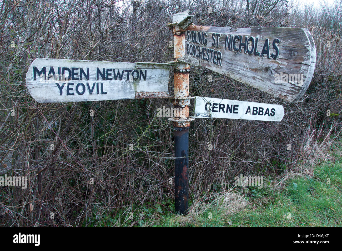 Rural signpost. An old traditional fingerpost points the way. It stands ...