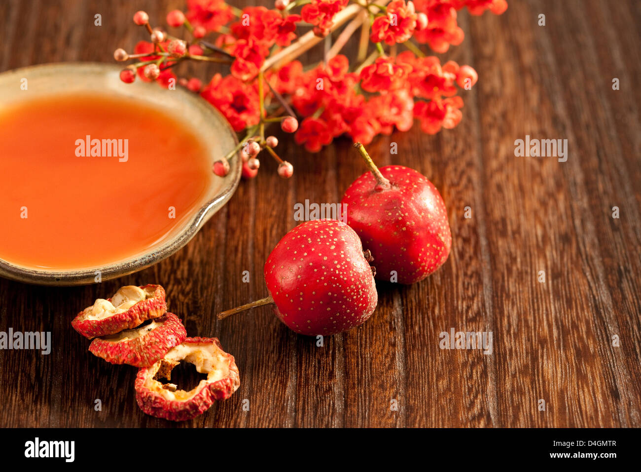 Hawthorne berry and juice Stock Photo - Alamy