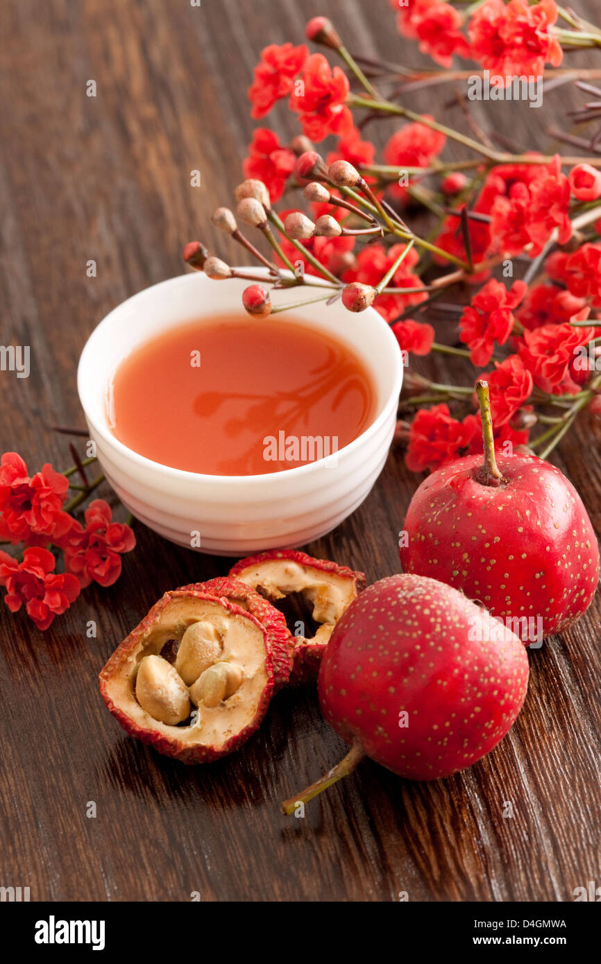 Hawthorne berry and juice Stock Photo - Alamy