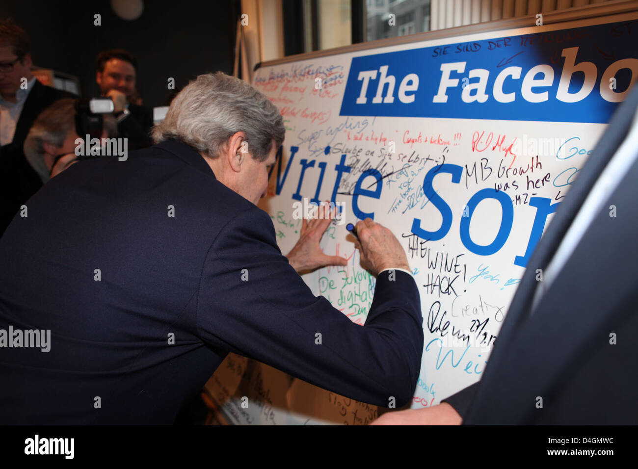 Secretary Kerry Signs a Facebook Wall Stock Photo - Alamy