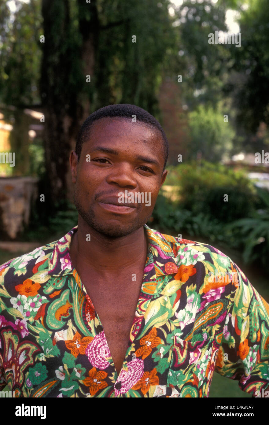 Zimbabwean man adult man waiter hi-res stock photography and images - Alamy