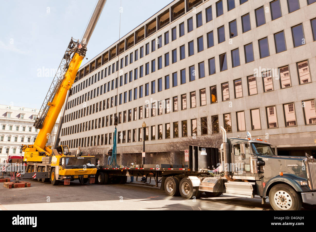 Crane Lifting Load Construction Site High Resolution Stock Photography ...