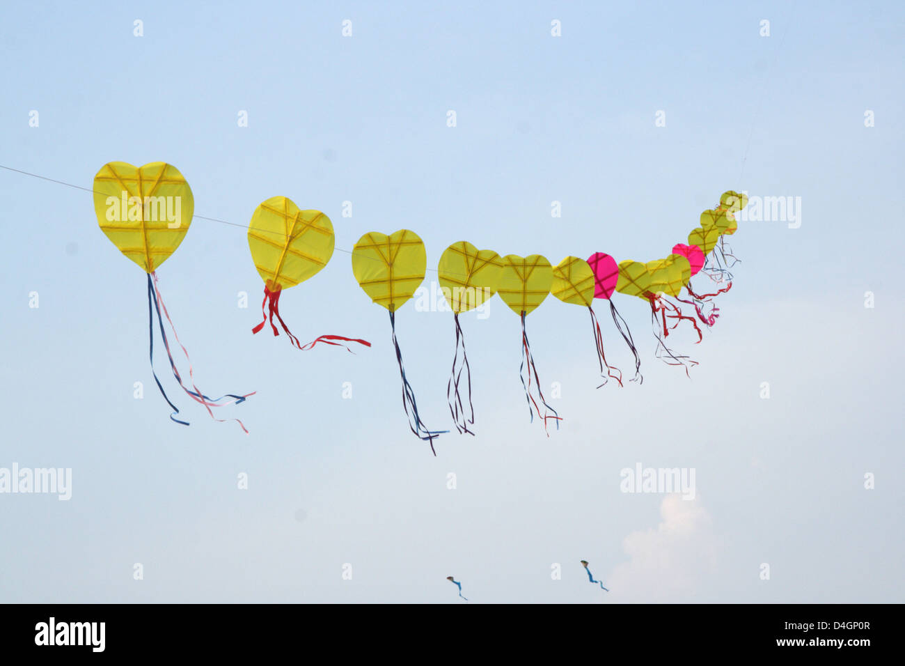 Row of kites on sky Stock Photo - Alamy