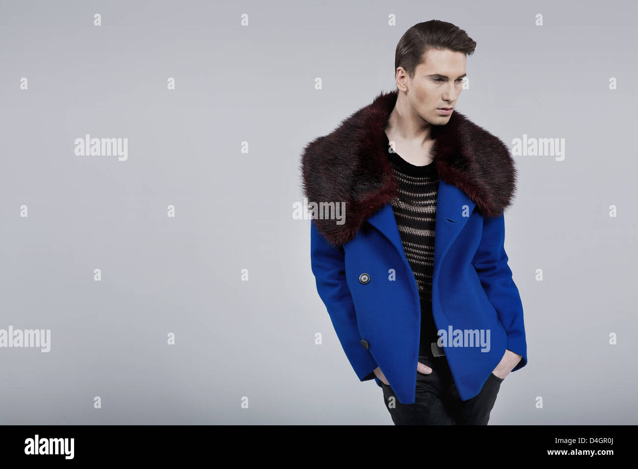 Handsome guy dressed in spring fashion coat Stock Photo - Alamy