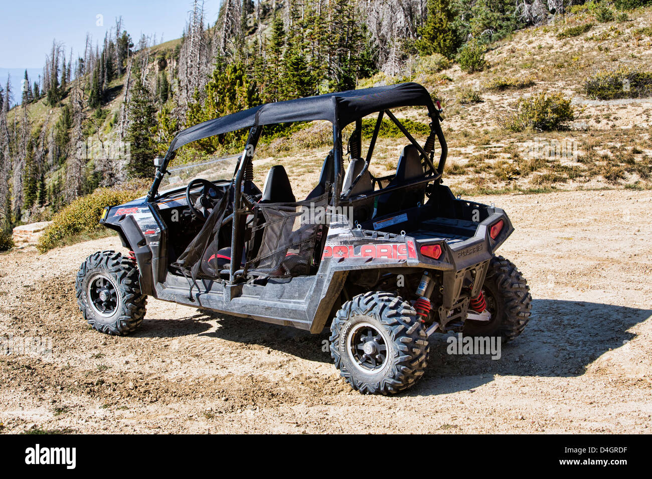 Sport vehicle Polaris RZR mountain forest. Fun outdoor recreation ...