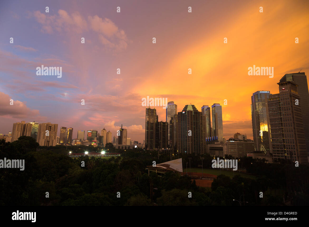 Jakarta cityscape at sunset shot from Senayan, Indonesia Stock Photo ...