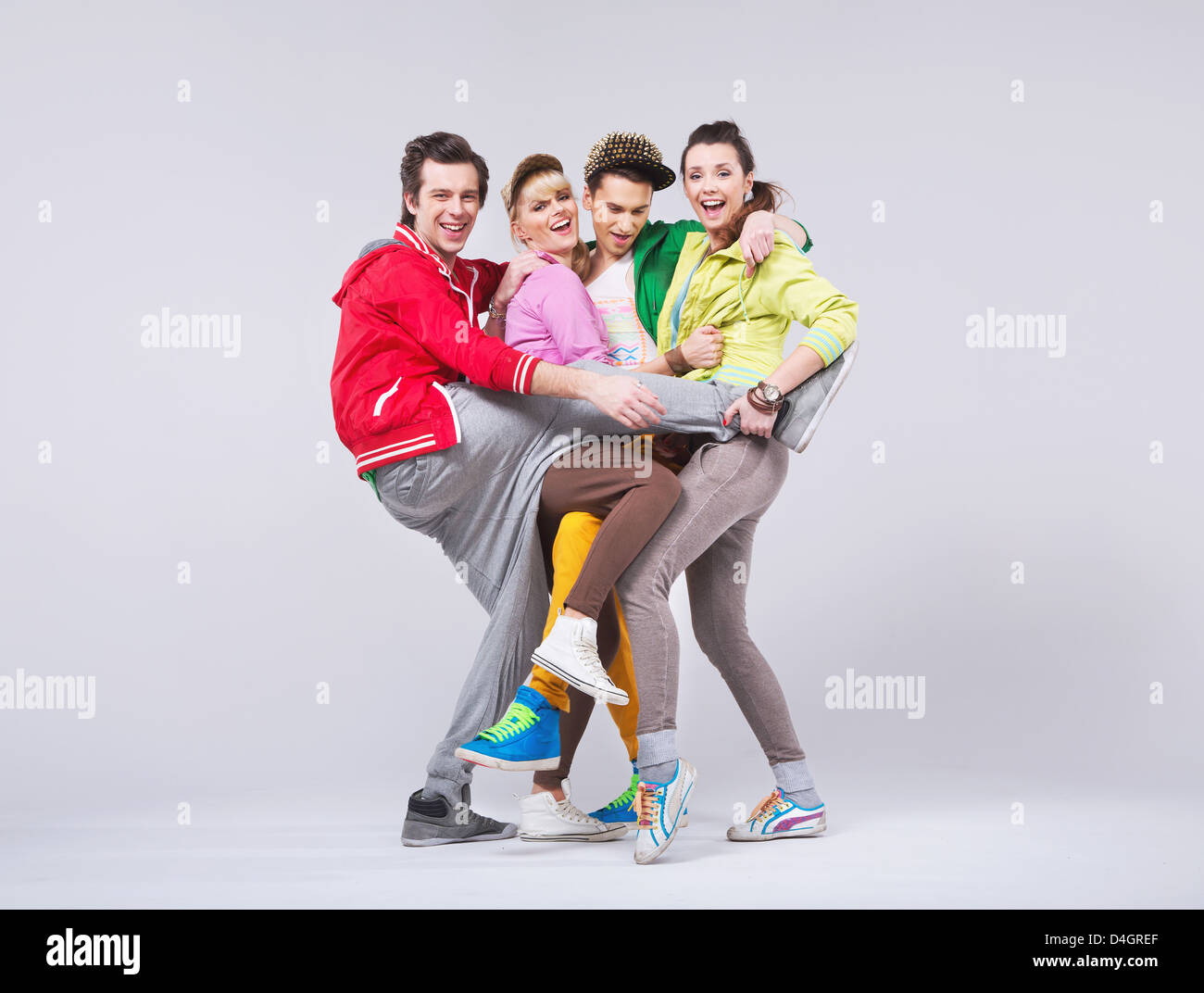 Two teenage couples in funny position Stock Photo - Alamy