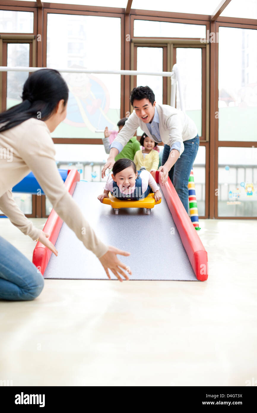 Going down the slide hi-res stock photography and images - Alamy