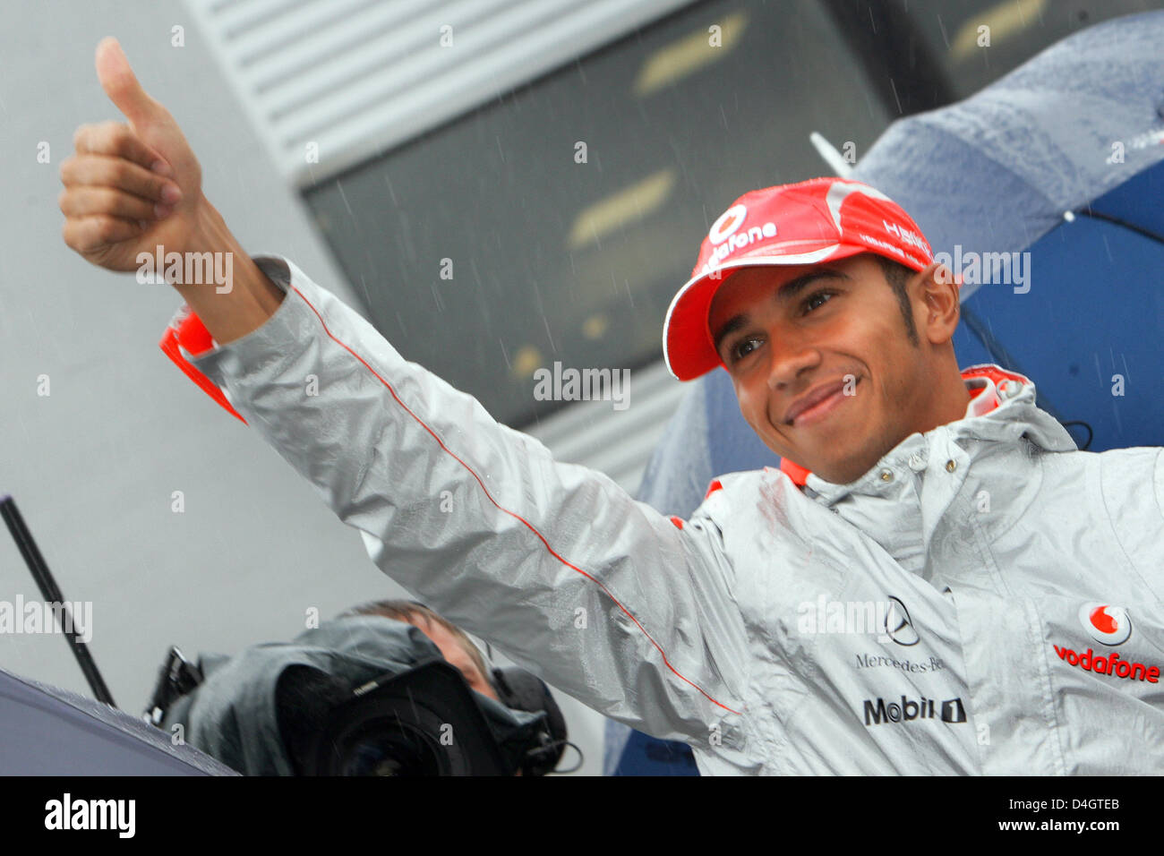 British Formula One driver Lewis Hamilton of McLaren Mercedes gives a ...