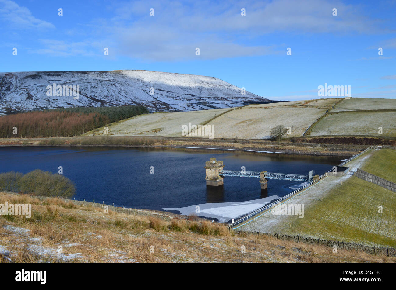 Lower Ogden Reservoir in winter sunshine near the village of Barley ...