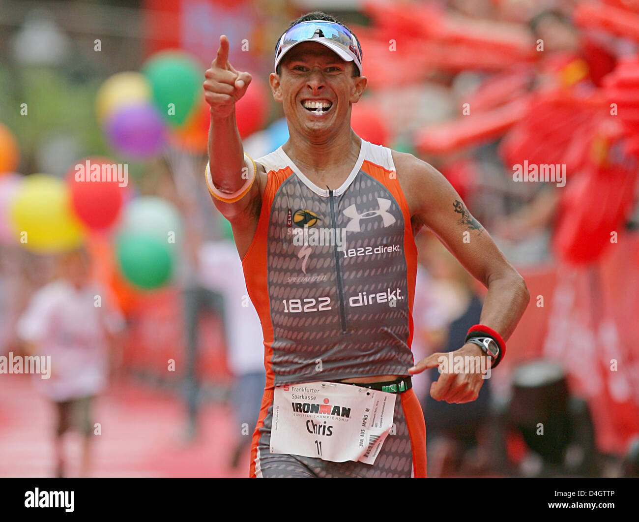 Chris McCormack (Australia) celebrates after winning Ironman Germany in ...