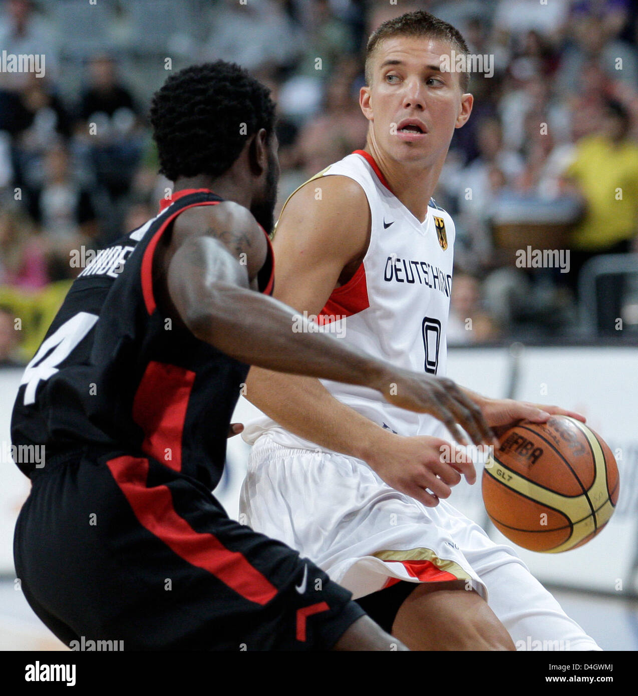 Germany's Steffen Hamann (R) and Canada's Jermaine Anderson shown in ...