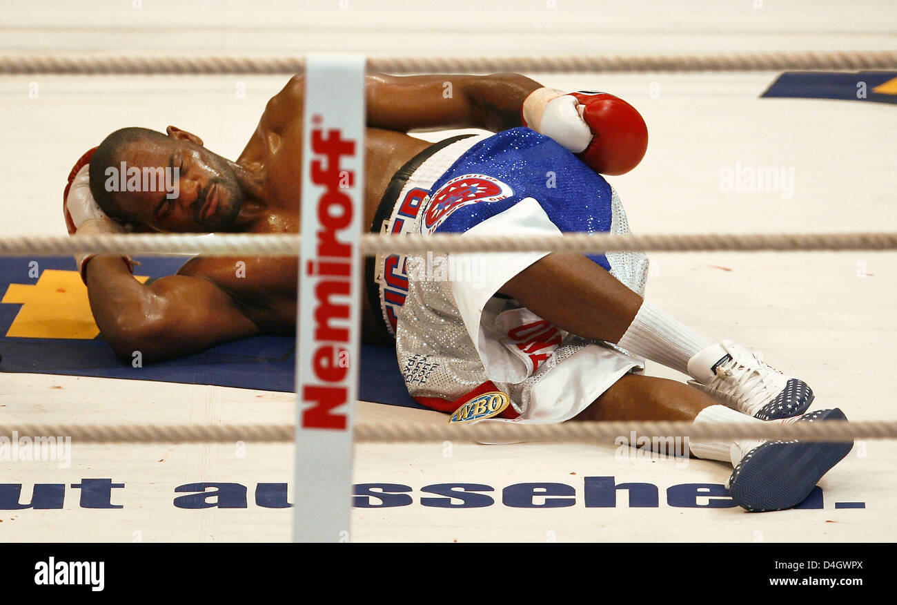 US heavyweight boxer Tony Thompson lies on the ground at the boxing ...
