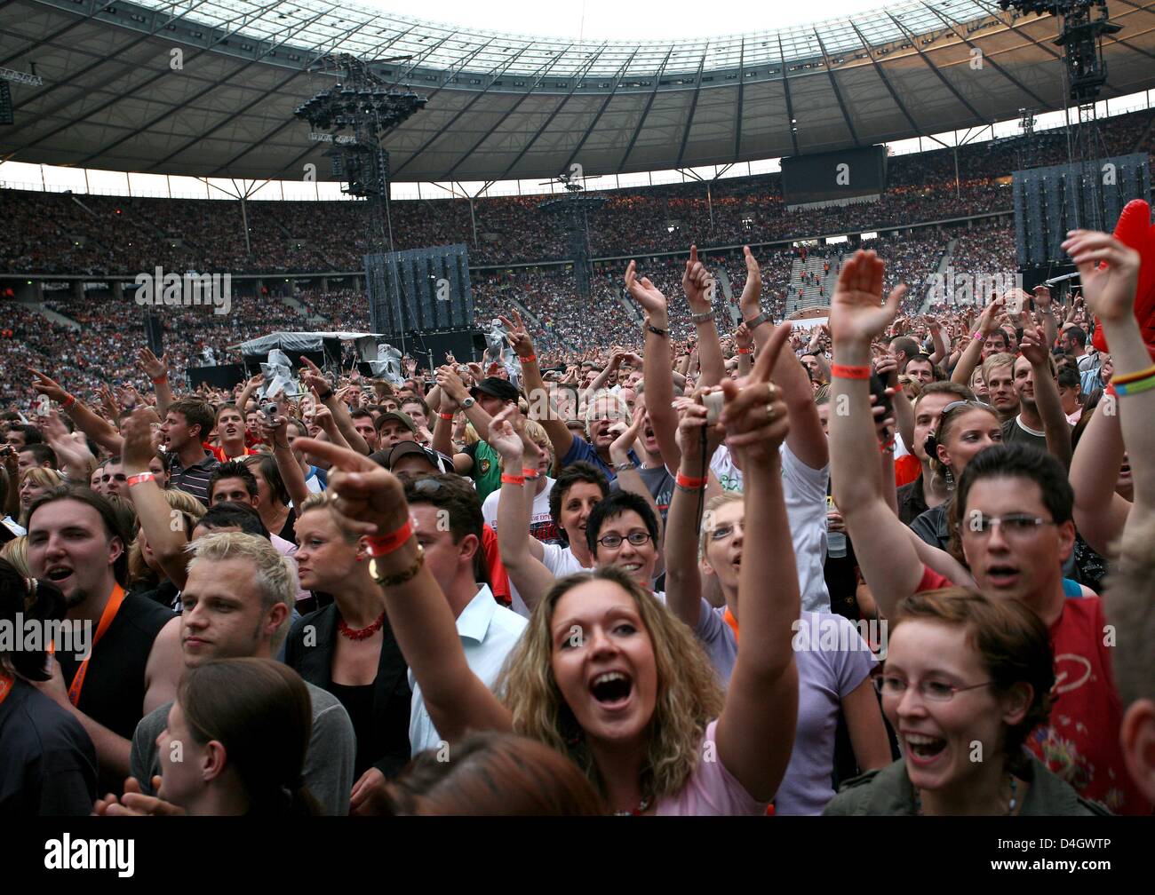Fans of German comedian Mario Barth cheer at the end of his tour at ...