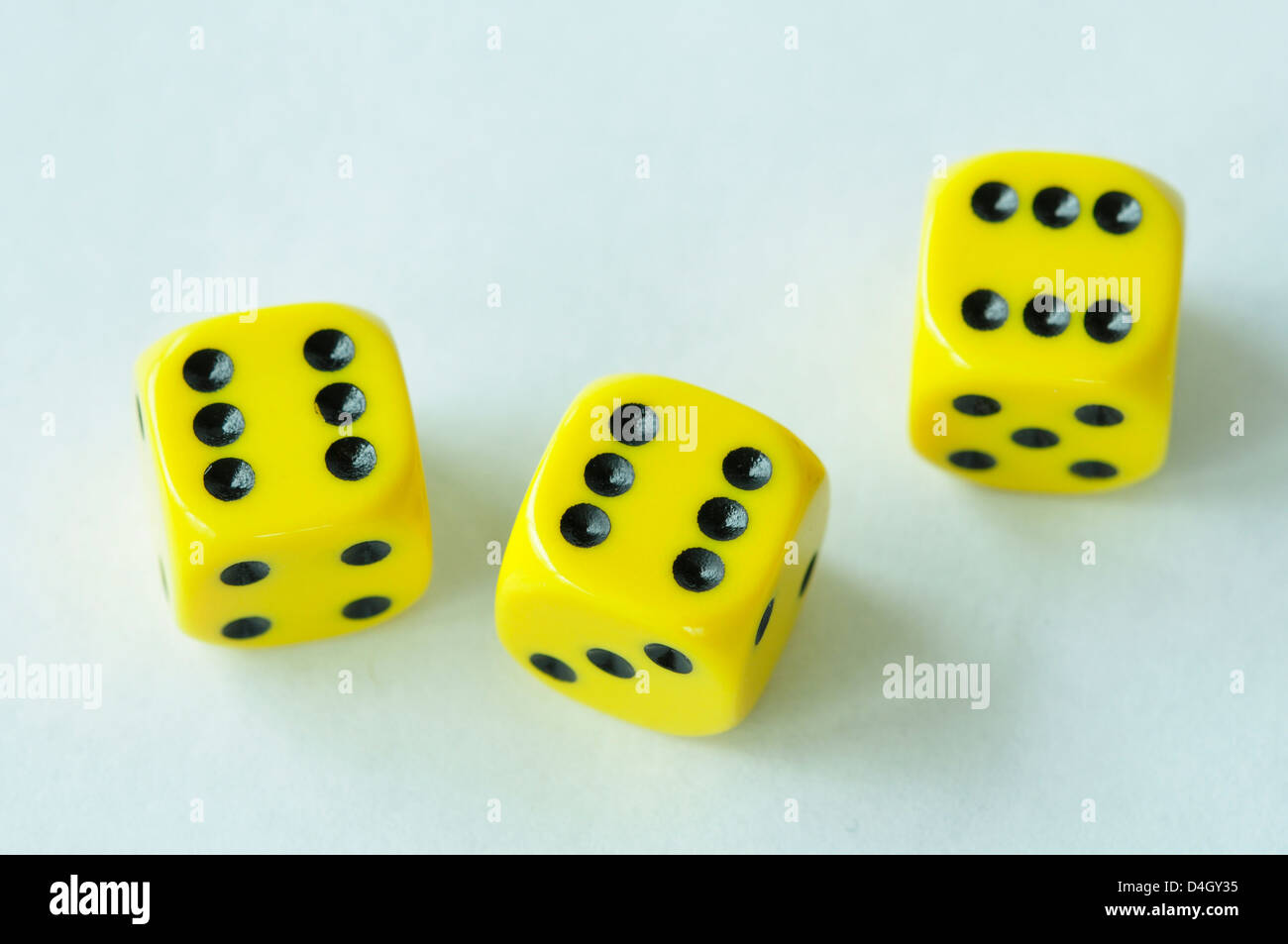 Treble six on three dice Stock Photo - Alamy