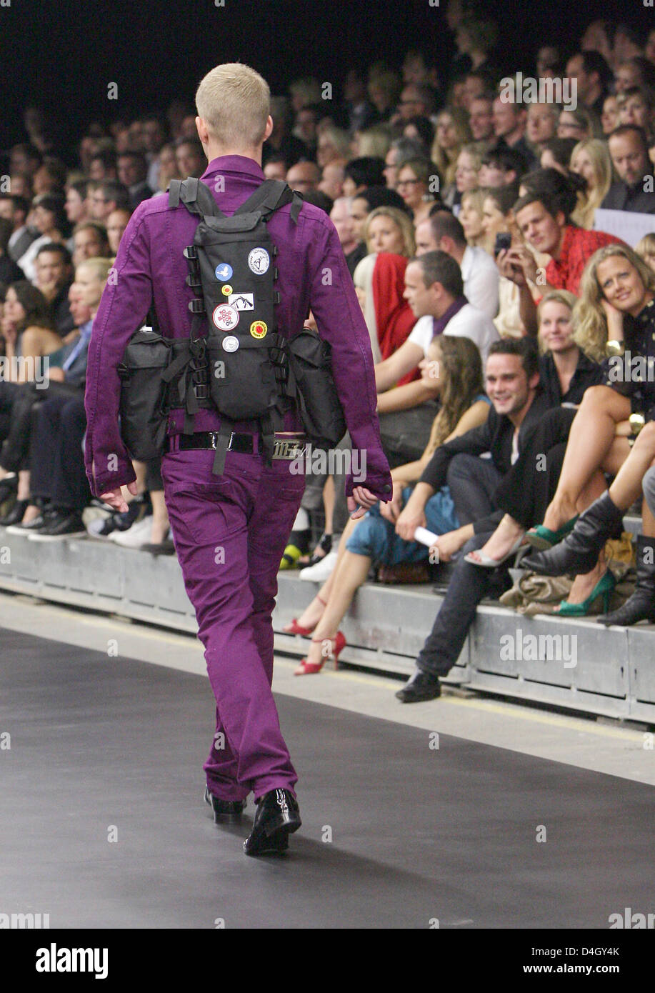 A model presents fashion by designer Michael Michalsky on the catwalk ...