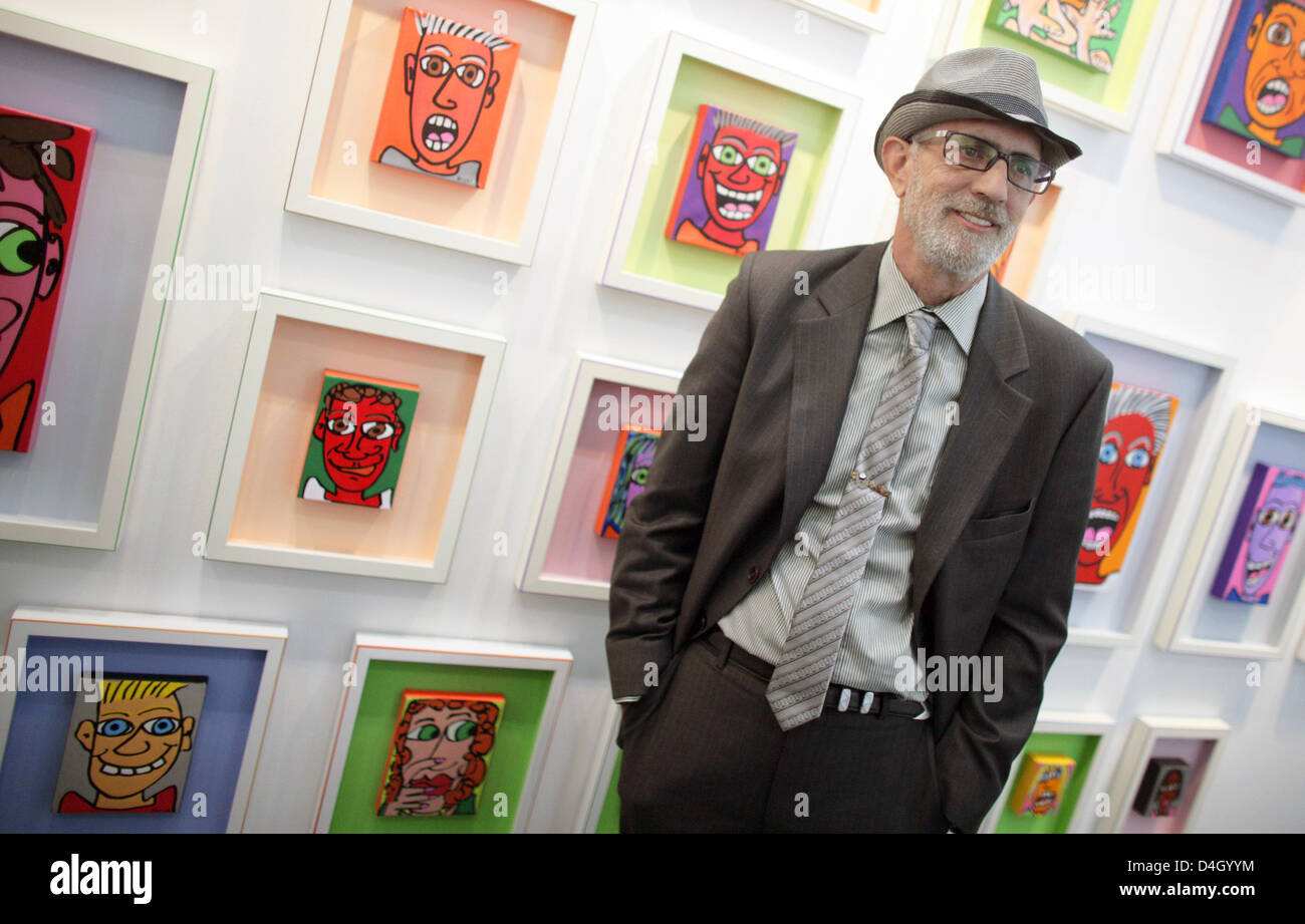 American pop artist James Rizzi poses in front his works 'Faces ...