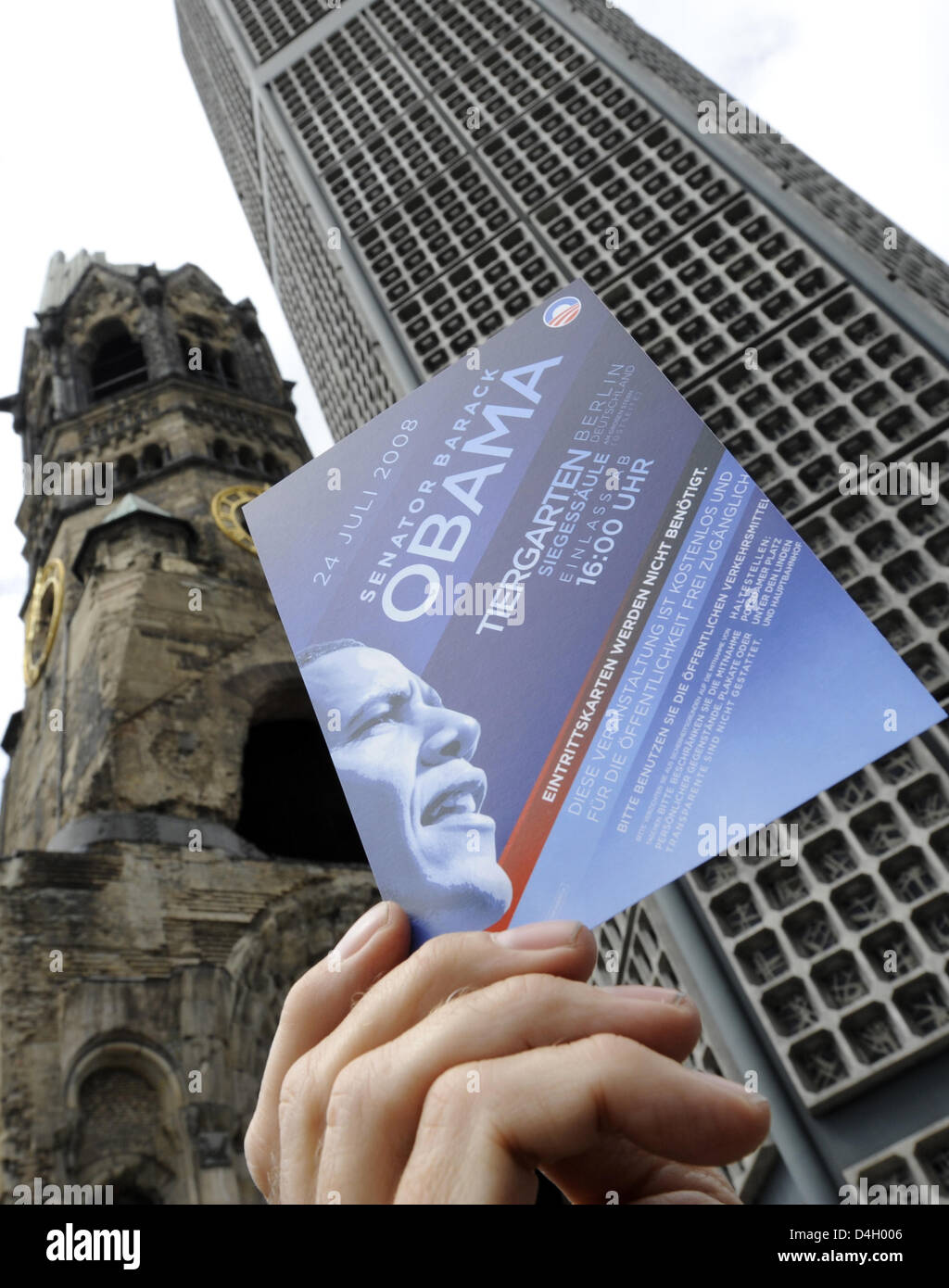 A party supporter of the American Democrats hands out flyers informing ...