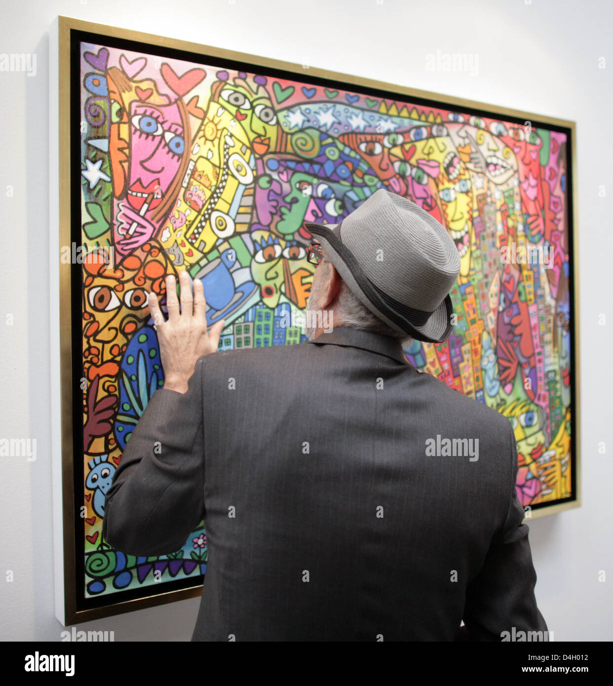American pop artist James Rizzi poses with his work 'the way you look ...