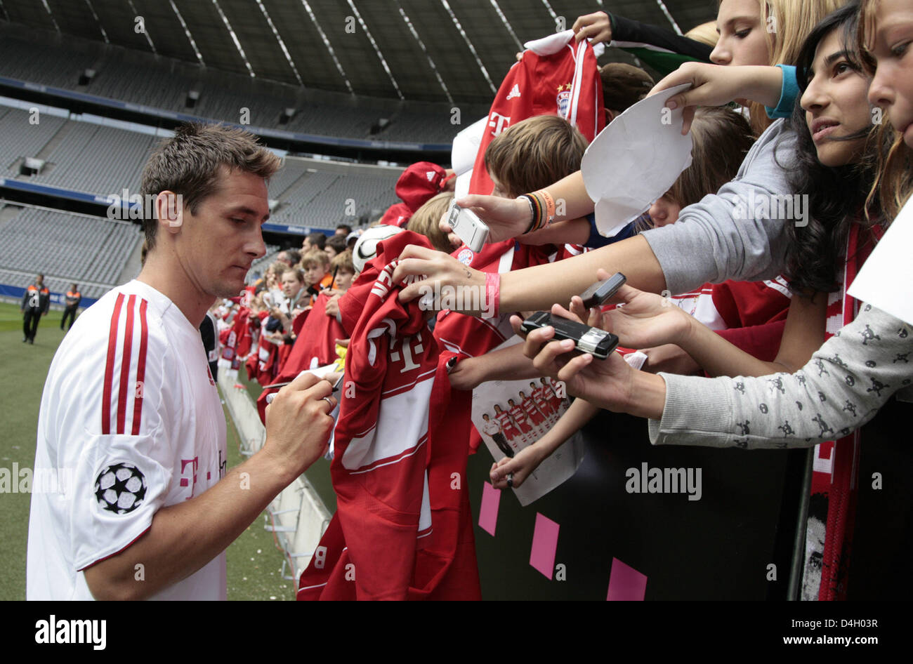 FC Bayern Munich player Miroslav Klose signs autographs after a team ...