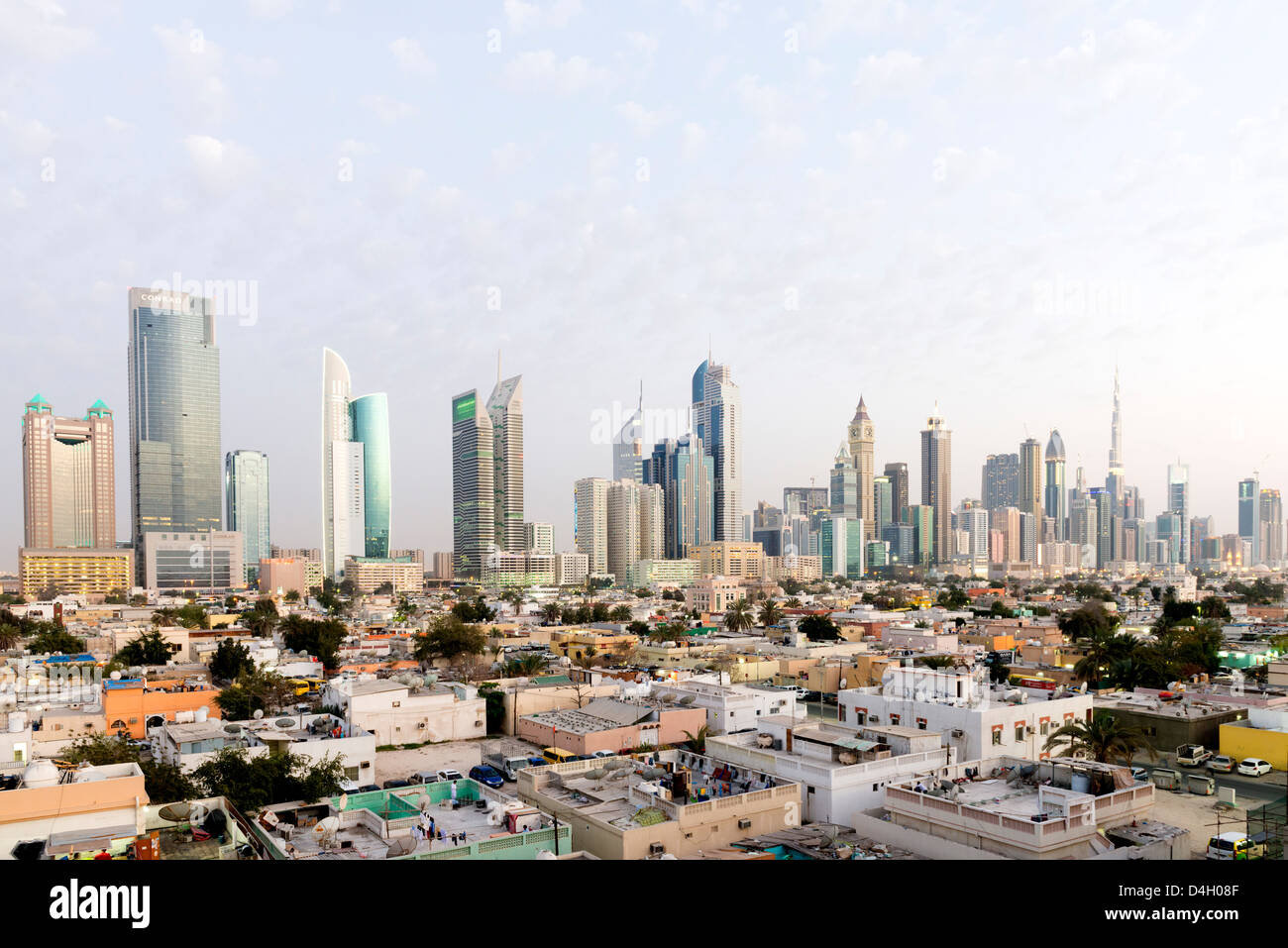 Daytime view across old Al Satwa district towards modern skyline of ...