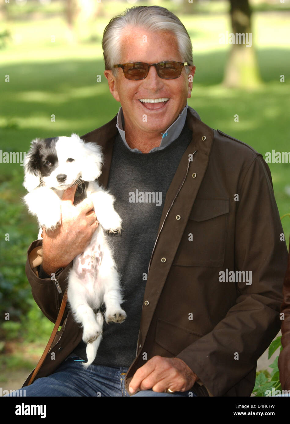 US-actor George Hamilton poses with his crossbreed dog 'Dodo' in ...