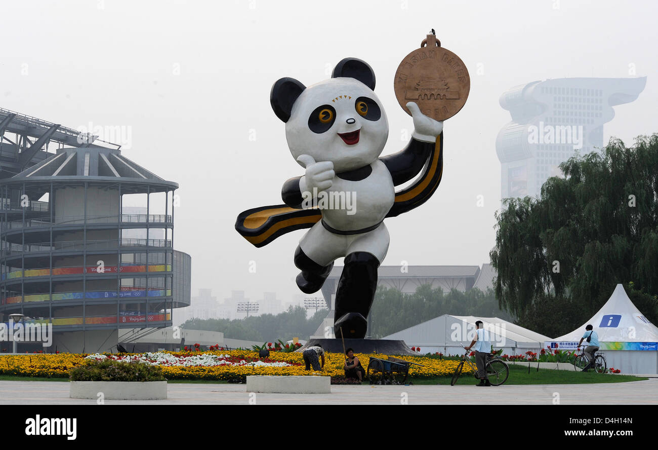 A mascot of 1990 Asian Games seen in front of the Olympic Stadium in ...