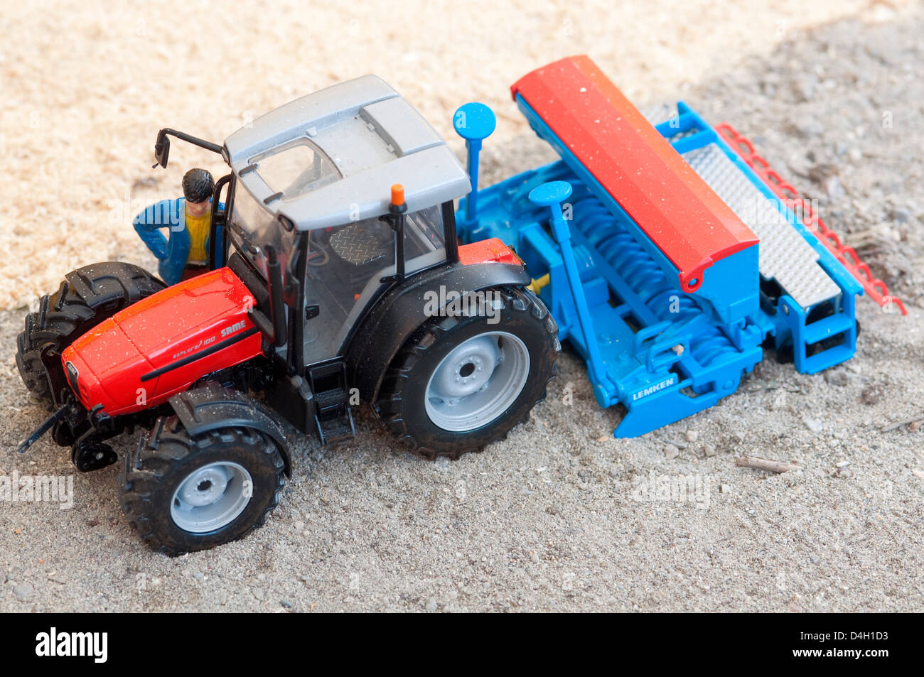 Blue toy tractor hi-res stock photography and images - Alamy