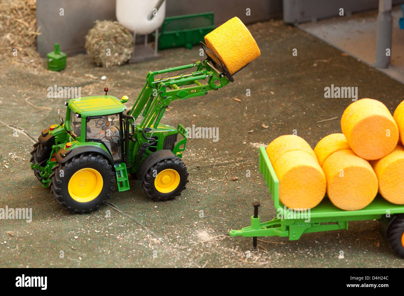 Blue toy tractor hi-res stock photography and images - Alamy