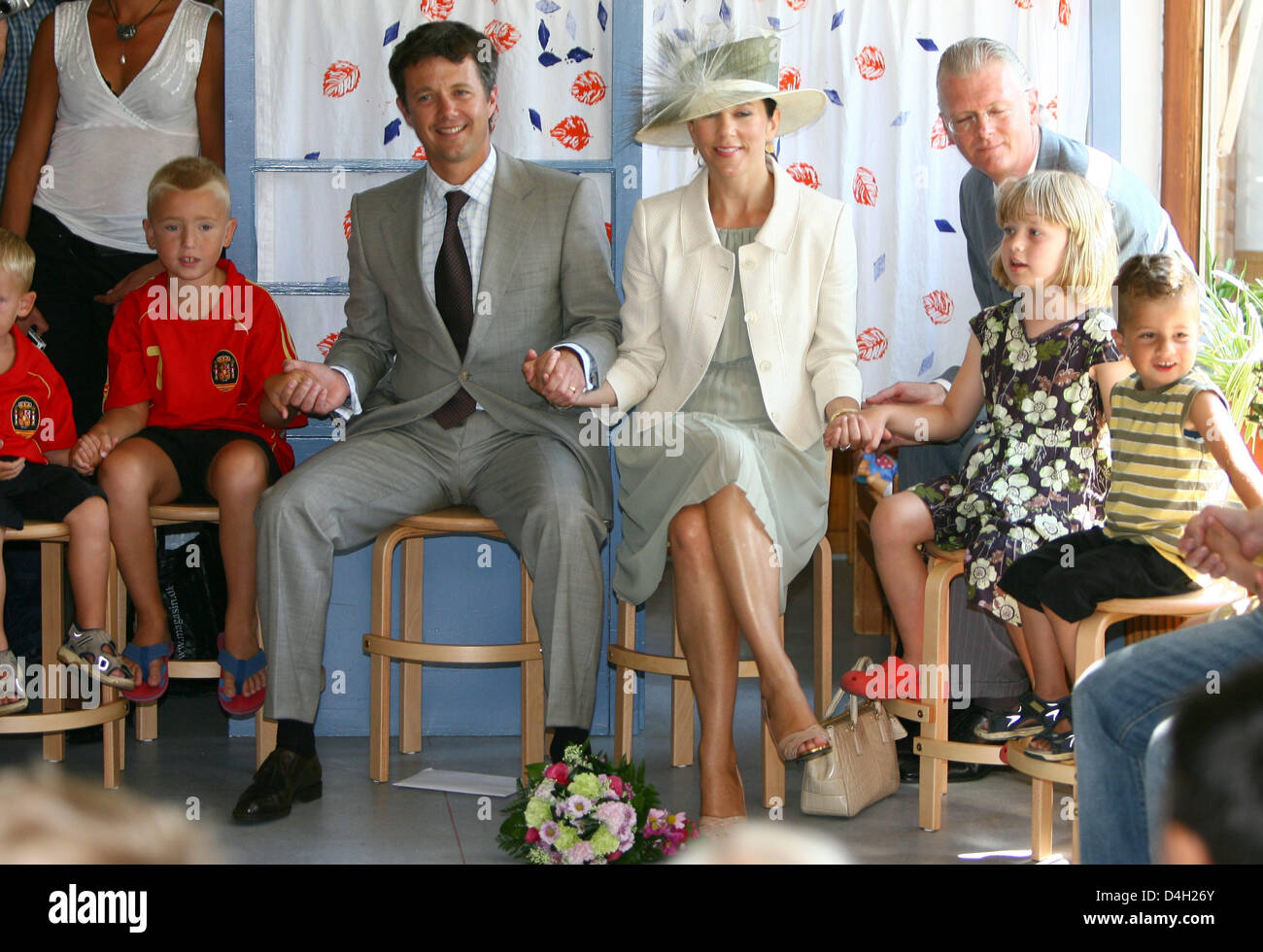 Crown Prince Frederik of Denmark (C-L) and his wife Princess Mary of ...