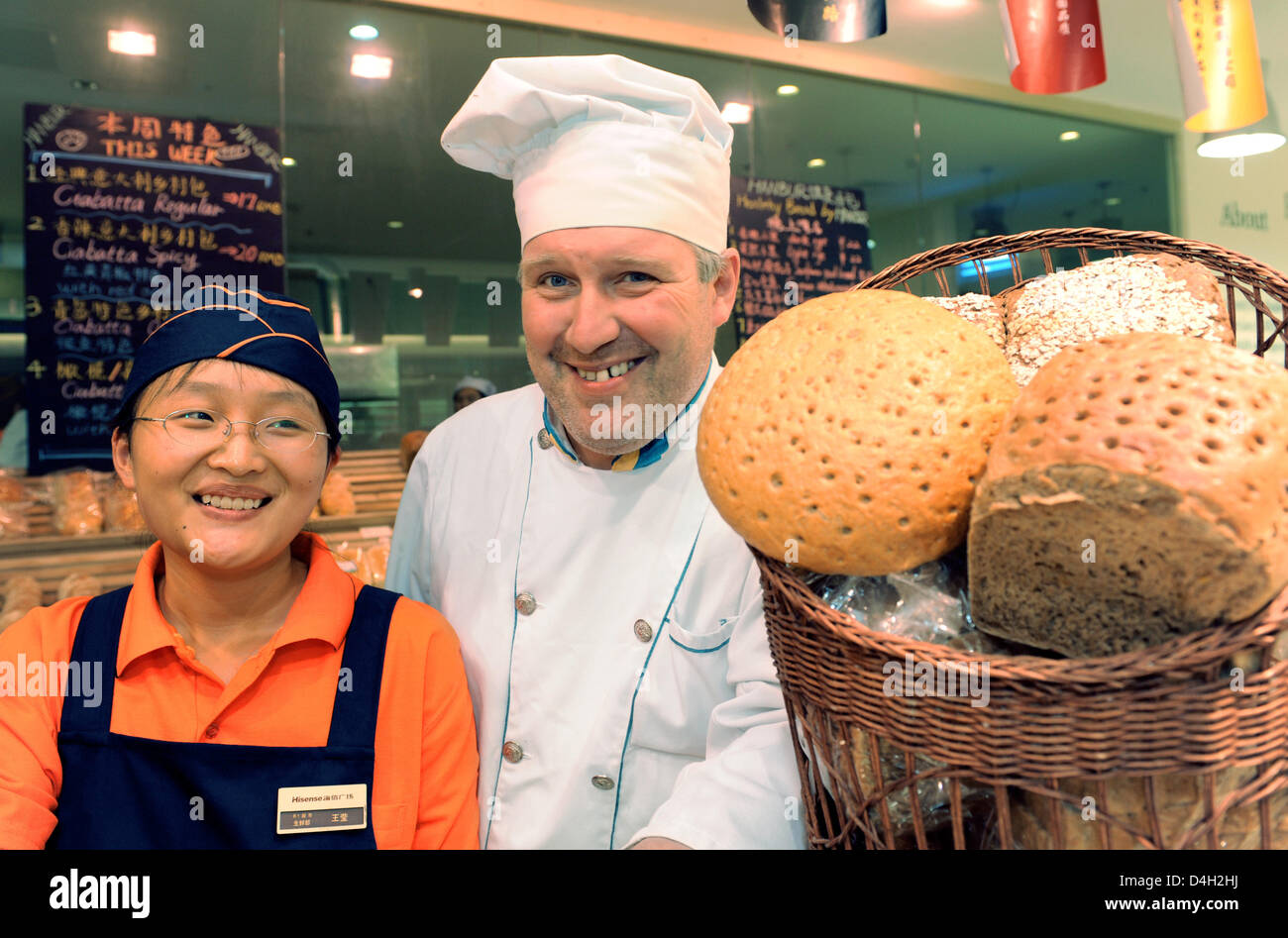 German baker Helmut Probst from Bavaria is pictured with an employee at ...