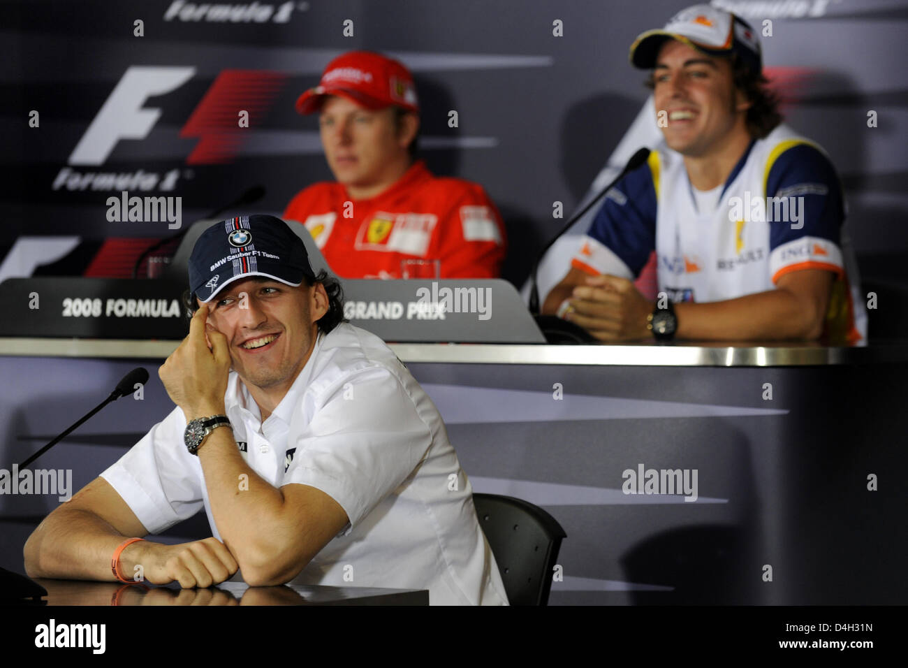 Polish Formula One driver Robert Kubica of BMW Sauber (front), Finnish ...