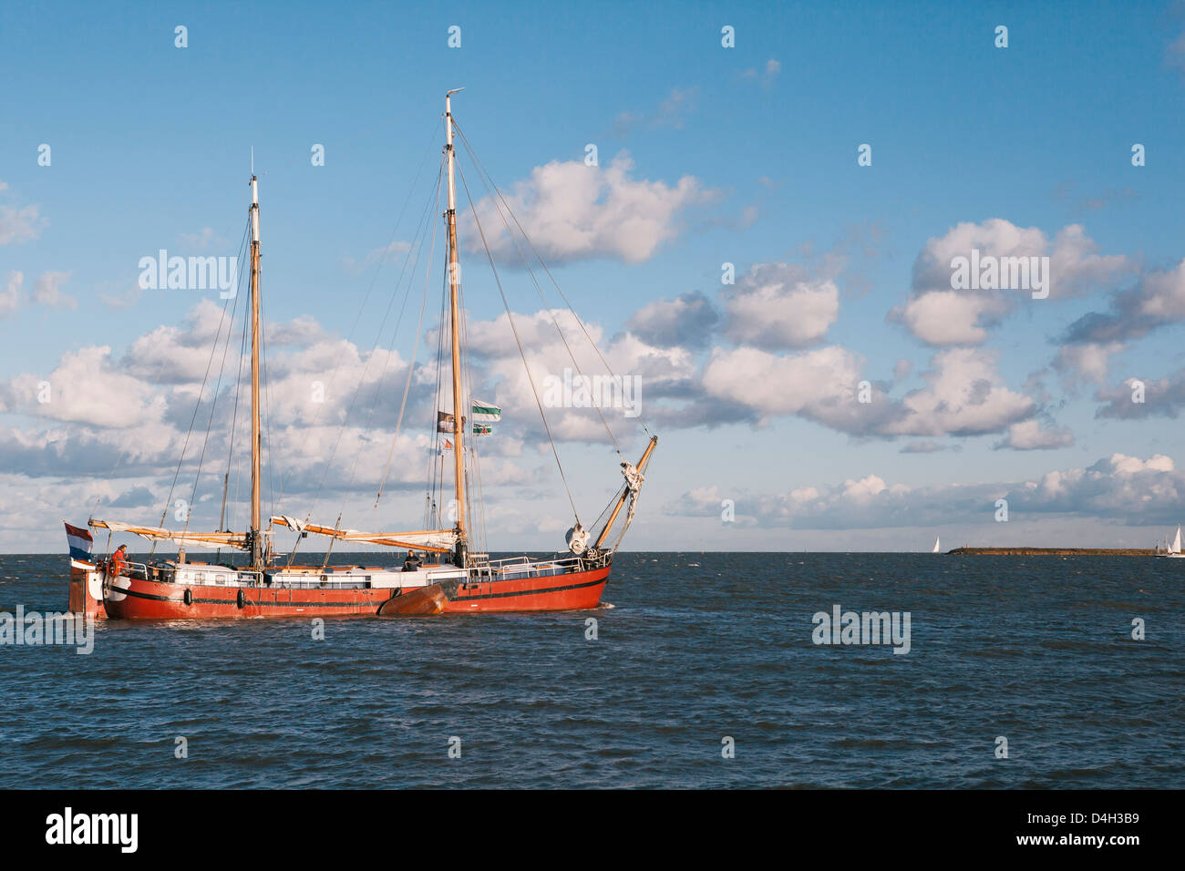 Traditional Dutch merchant ship on the IJselmeer lake, Volendam, North ...