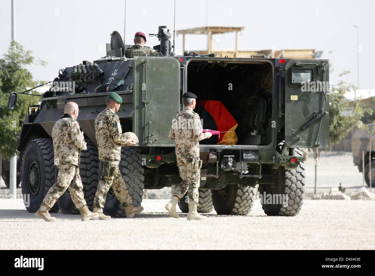Brigadier general Juergen Weigt (R), Colonel Rainer Buske (C) and ...