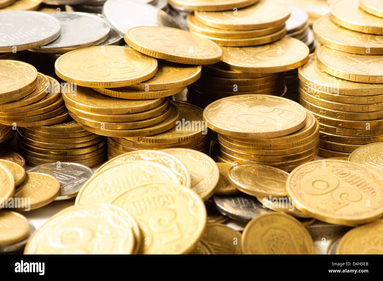 Stacks of coins. Isolated on white background Stock Photo - Alamy