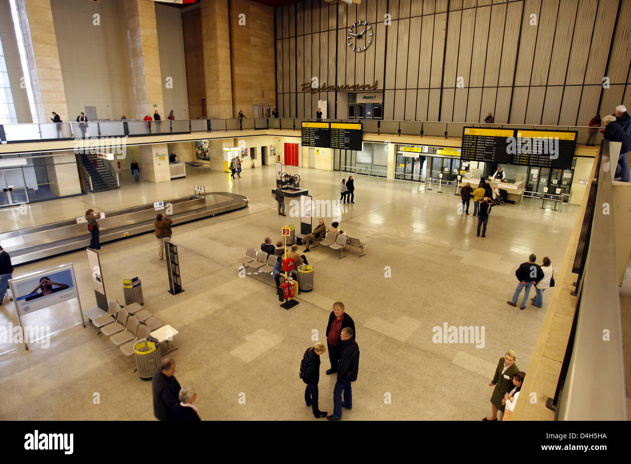 Visitors seen inside the departure hall of Berlin's 'Tempelhof' airport ...
