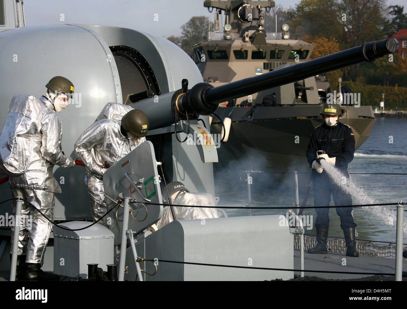 Fake smoke comes out of the hull of a German speed boat on the marines ...