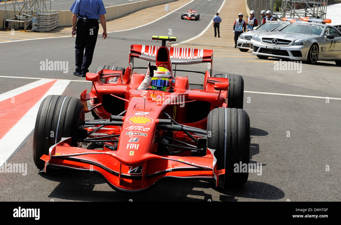 Brazilian Formula One driver Felipe Massa of Ferrari gestures after he ...