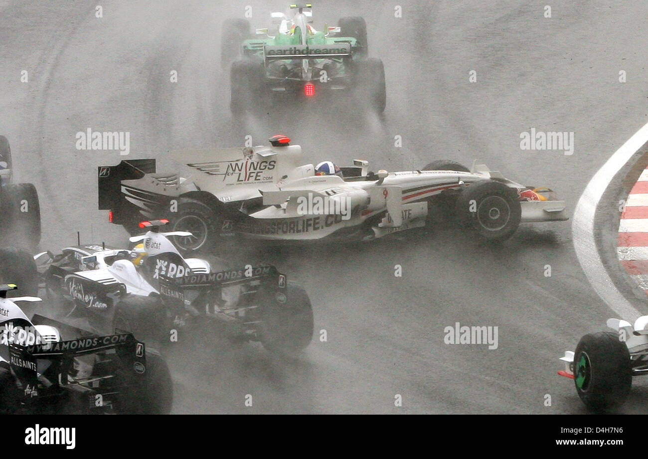 Scottish Formula One driver David Coulthard of Red Bull spins after the ...