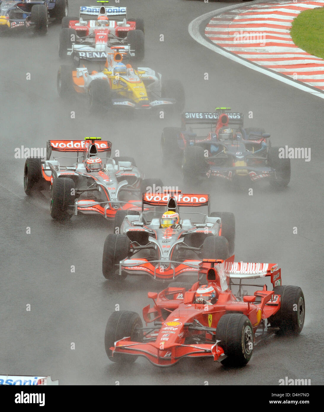 Finnish Formula One driver Kimi Raikkonen of Ferrari steers his car ...