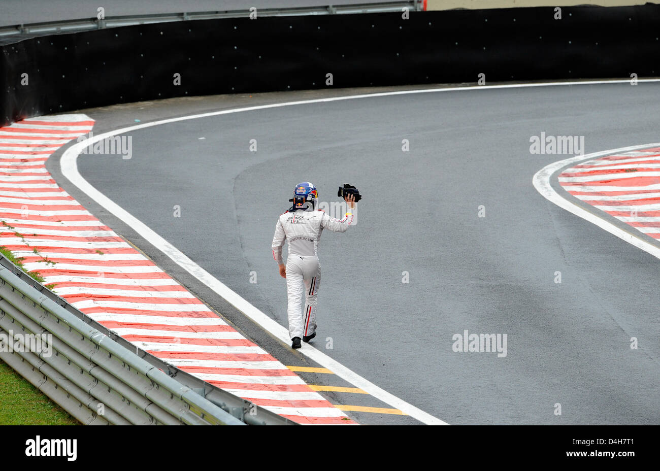 Scottish Formula One driver David Coulthard of Red Bull walks back to ...