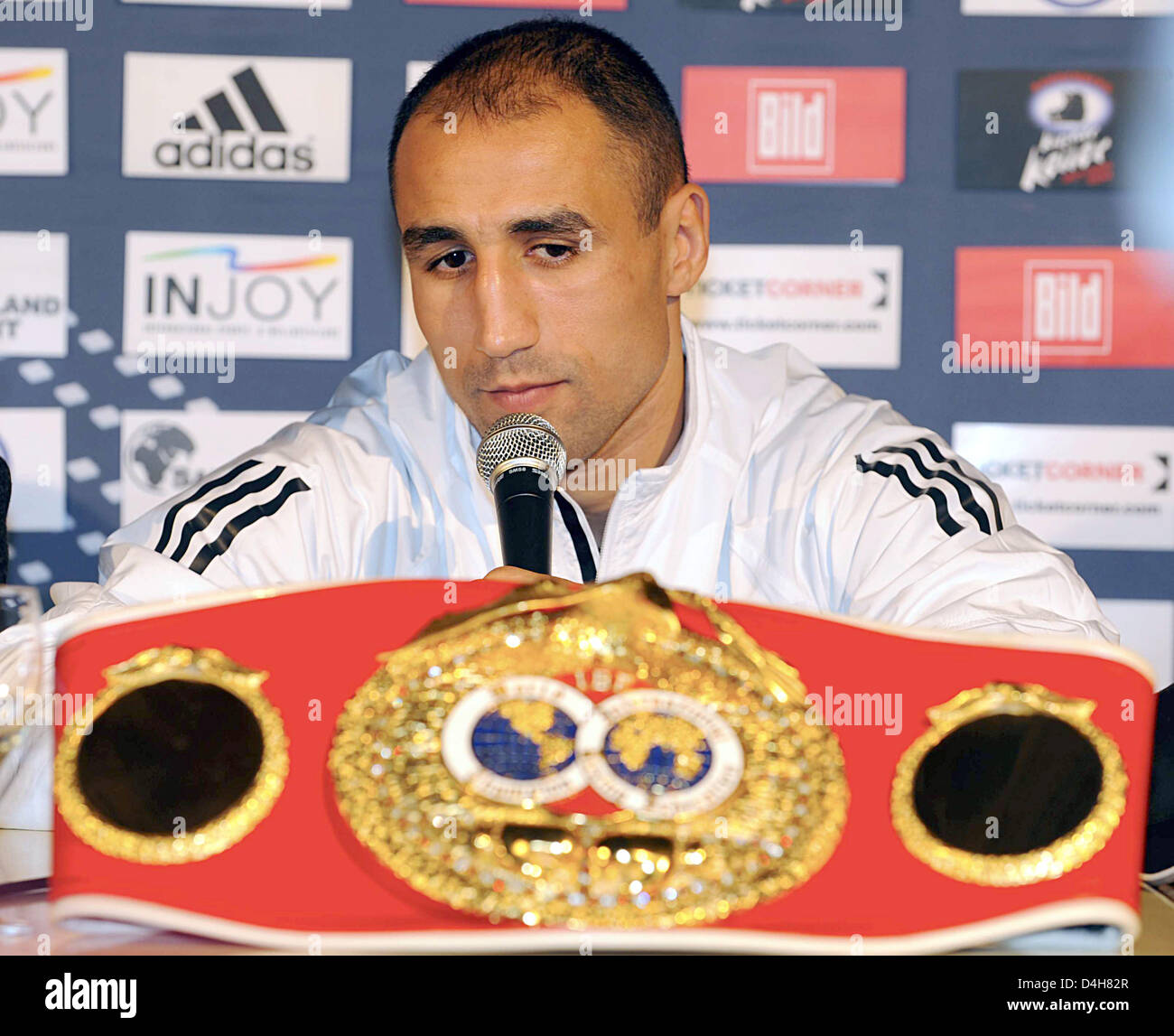Boxer King Arthur Abraham is pictured with his World Champion belt ...