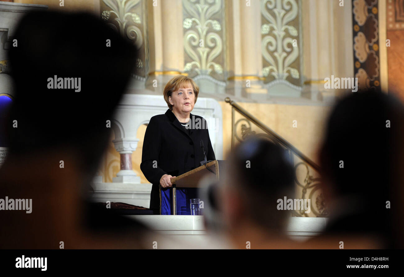 German Chancellor Angela Merkel delivers a speech during the official ...