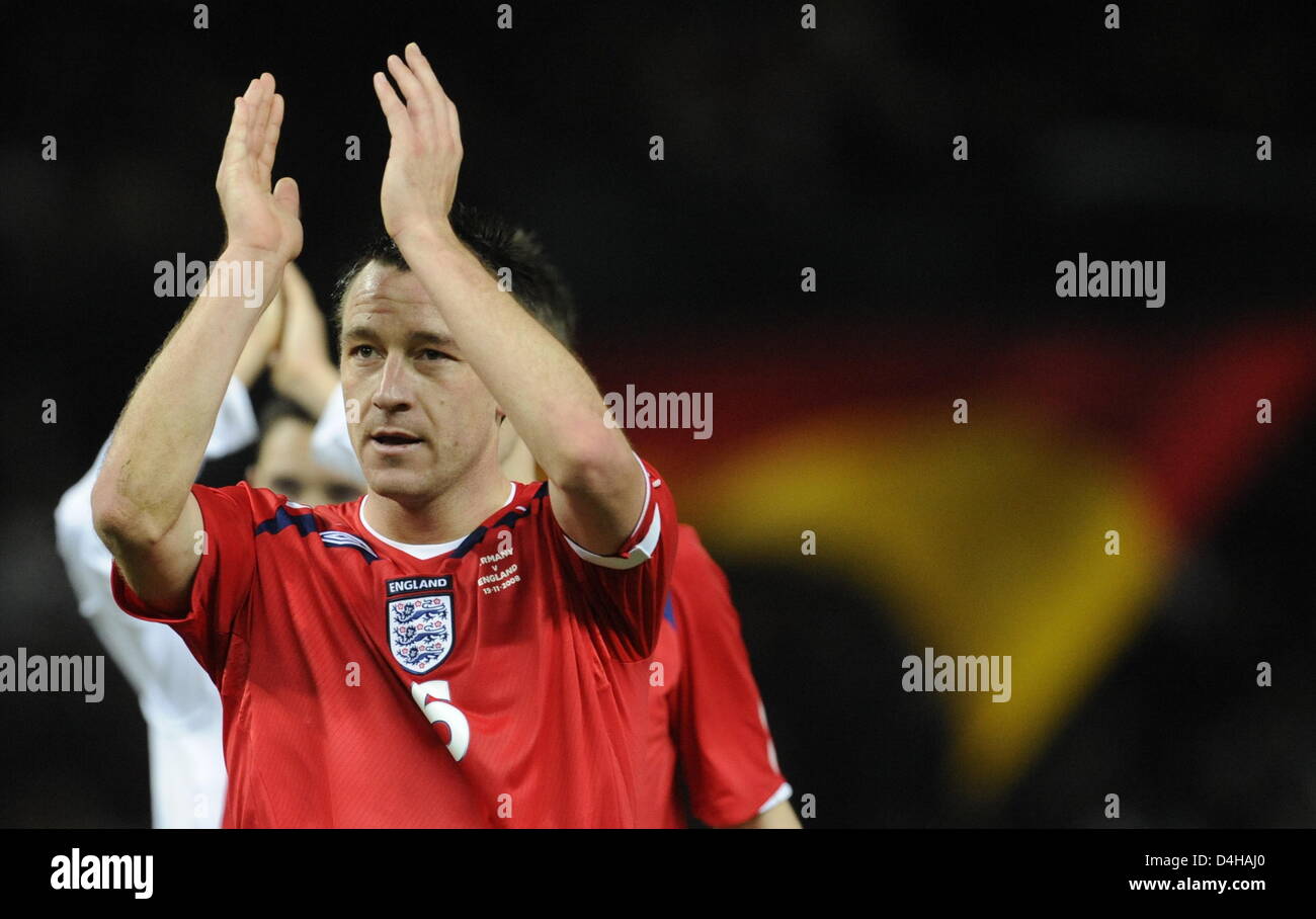 English national player John Terry celebrates after the soccer friendly ...