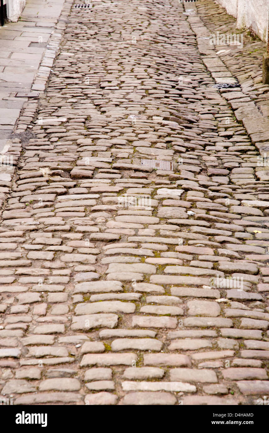 cobbled street surface in quiet back lane, conservation,protected ...
