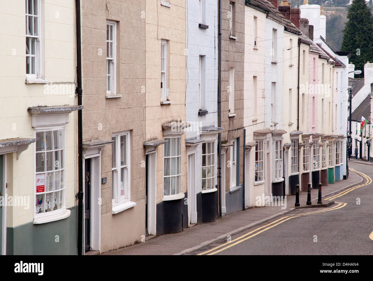 painted cottages in town back street, cobbles,bracketed street lamp ...