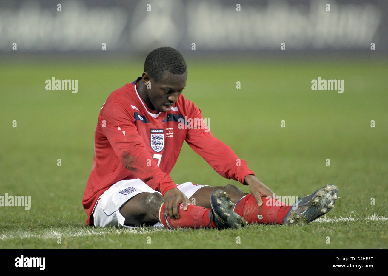 England?s Shaun Wright-Philips sits on the lawn after the friendly ...