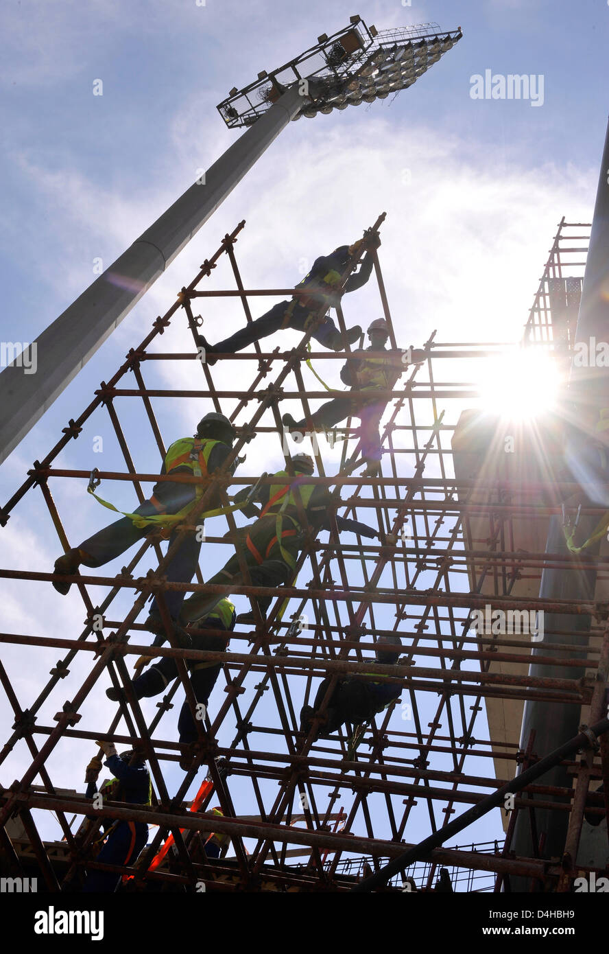 Construction workers are pictured on a scaffold at Royal Bafokeng ...