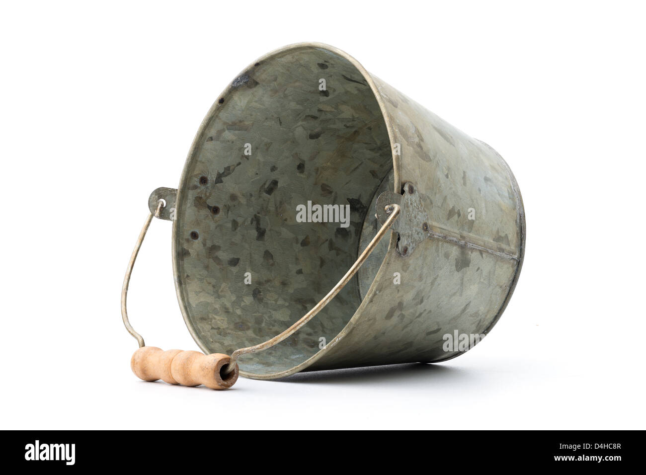Houseware: old, time-worn, rusty zinc-coated bucket, isolated on white ...