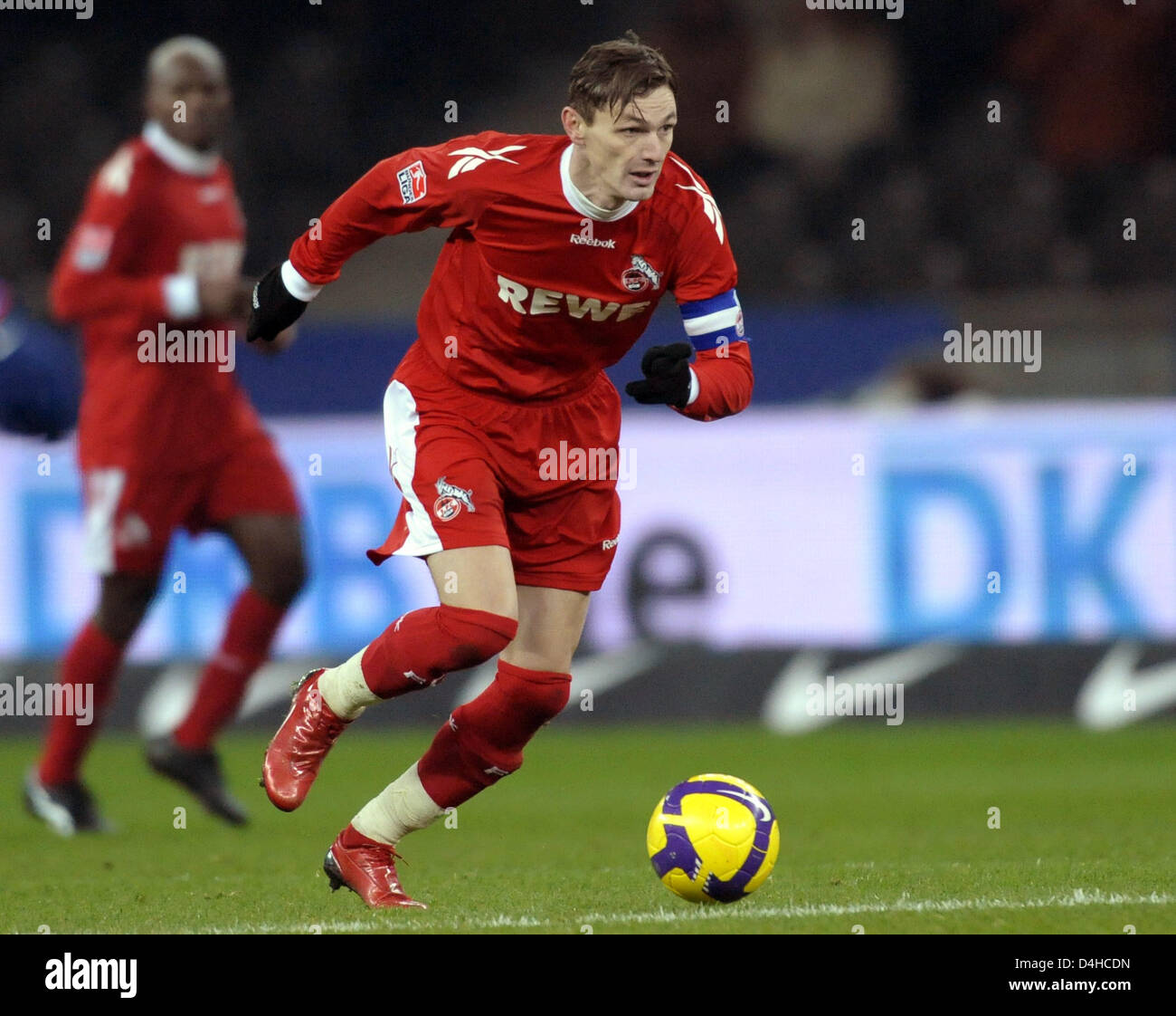 Cologne?s Milivoje Novakovic (C) seen in action during the Bundesliga ...